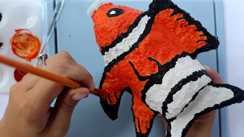 Make a fish mobile using CelluClay™ Papier Mache and recycled materials!